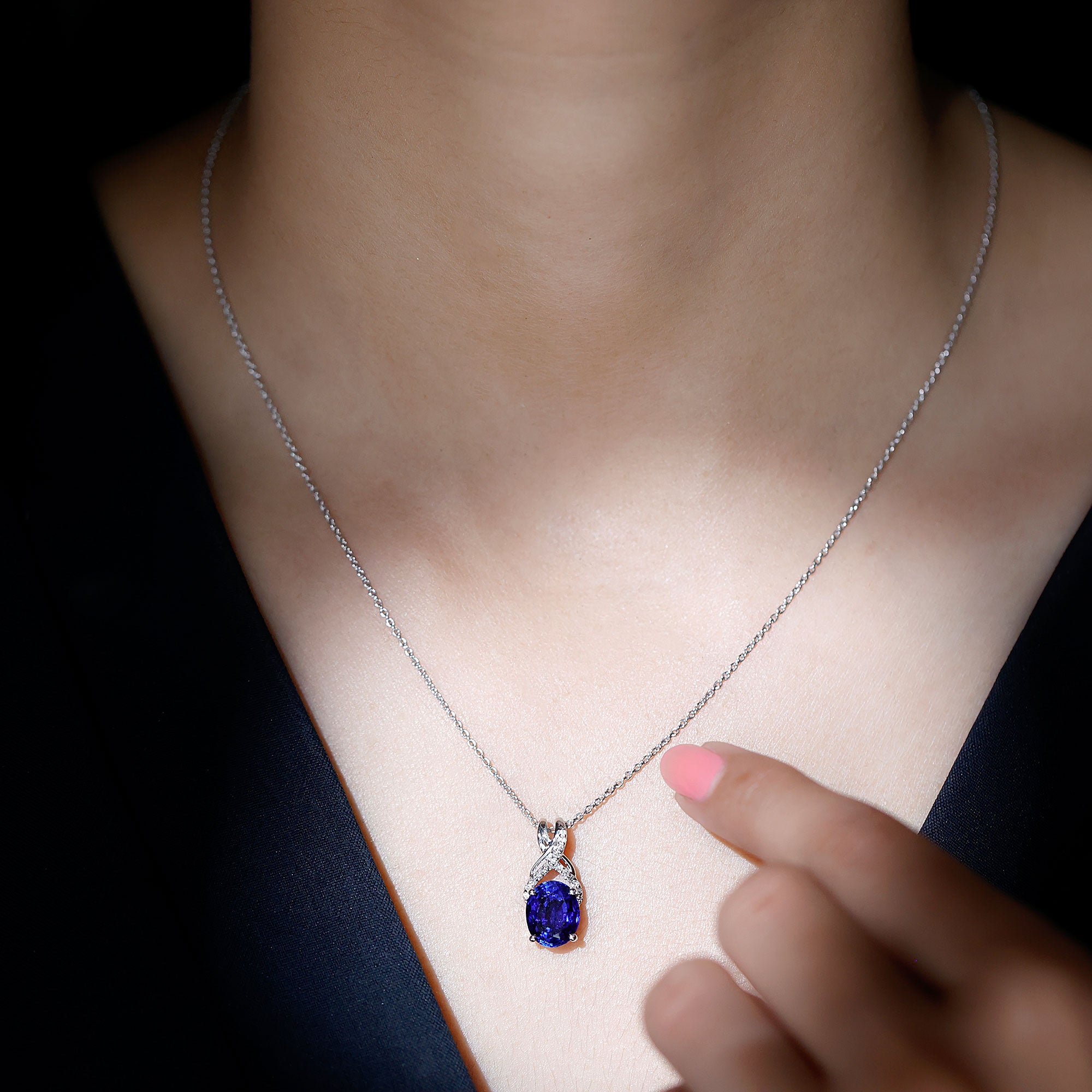 Oval Created Blue Sapphire Solitaire Pendant with Diamond Twisted Bail Rosec Jewels UK